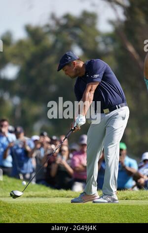 Bryson DeChambeau hits his tee shot on the 15th hole during the first ...