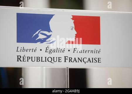 Motto of the French Republic on a cardboard sign "Liberty, Equality ...