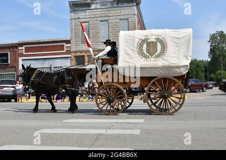 Members of the Commanding General's Mounted Color Guard salute during ...