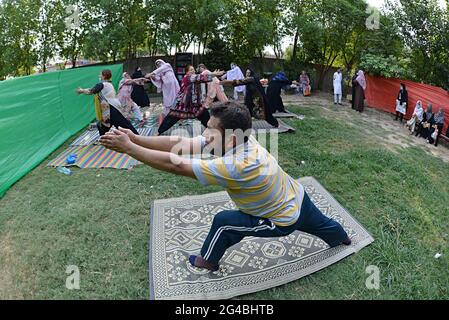 Pakistani people performing yoga session at the historical Shalimar ...