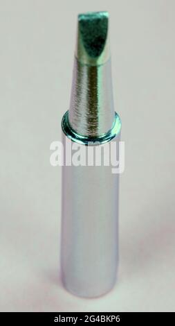 Soldering tips on pink background Stock Photo - Alamy