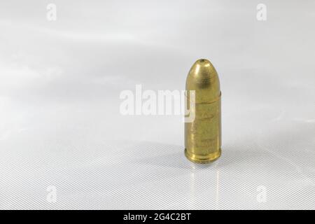 close up bullet 9mm parabellum FMJ (Full Metal Jacket ) on reflection ...