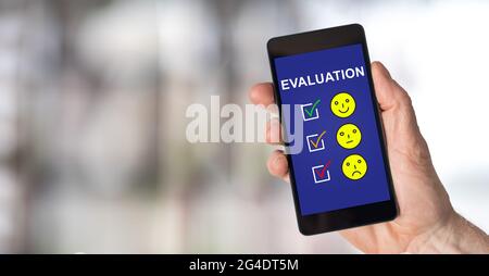 Smartphone screen displaying an evaluation concept Stock Photo - Alamy