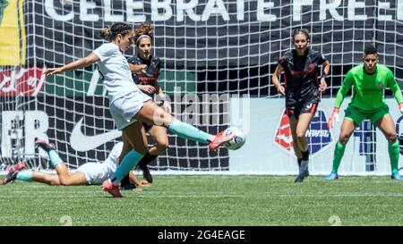Kansas City forward Darian Jenkins shoots for the goal during the ...