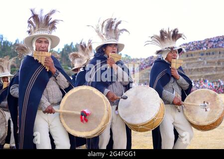 Inti Raymi, festival of the sun, musicians with siku, pan flute, ruins ...