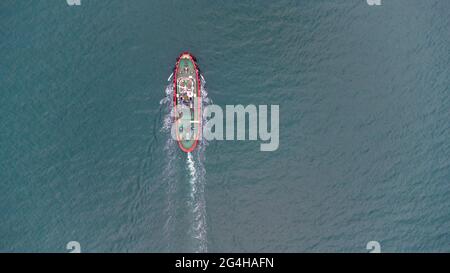 Fire boat on duty in the port water area. Aerial view Stock Photo - Alamy