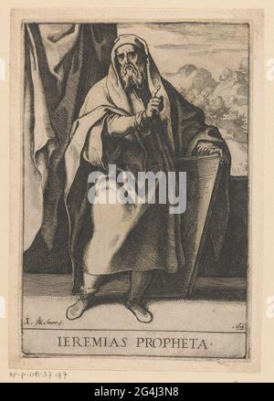 The prophet Jeremiah standing in a landscape with trees and in the ...