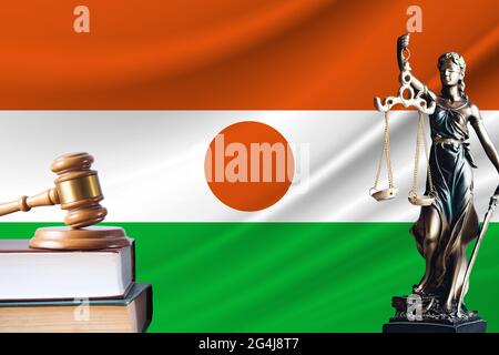 Niger flag with statue of lady justice, constitution and judge hammer ...