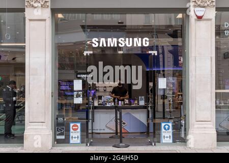 Samsung logo is seen at one of their stores on Oxford Street in London ...