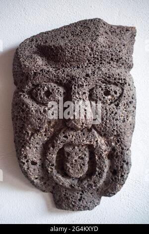 lava stone mask Stock Photo - Alamy
