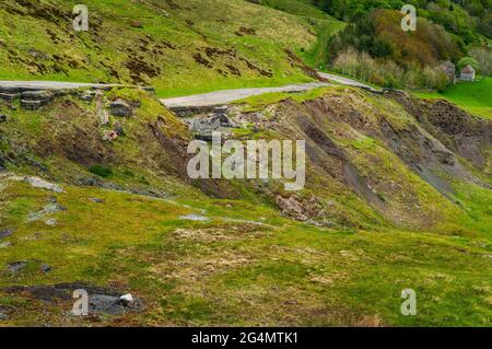 The collapsed road on the flanks of Mam Tor, caused by the continuous ...
