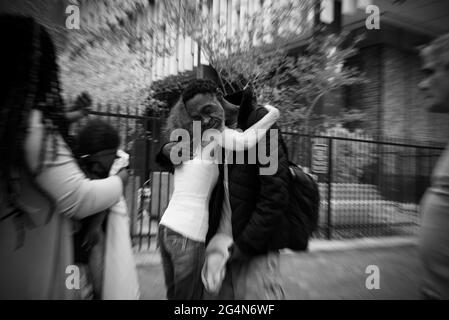 Tampa, FL, USA. 22nd June, 2021. Two homeless women cover themselves ...