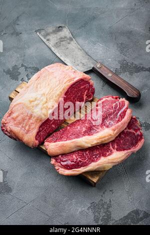 Veiny steak, marbled beef raw meat, on dark wooden background, top view ...