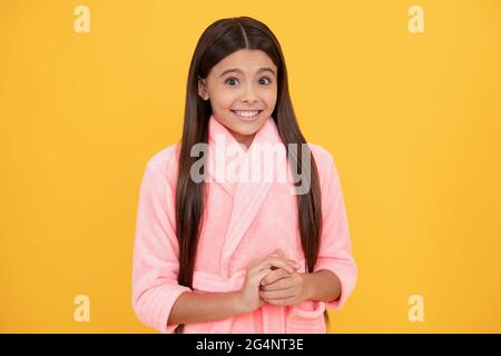 good morning. kid wear soft nightsuit play with toy. child in cozy ...