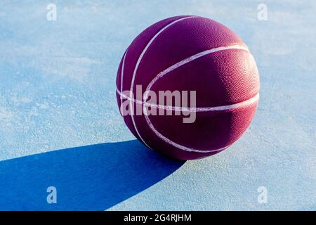 Purple basketball closeup on the playground Stock Photo - Alamy