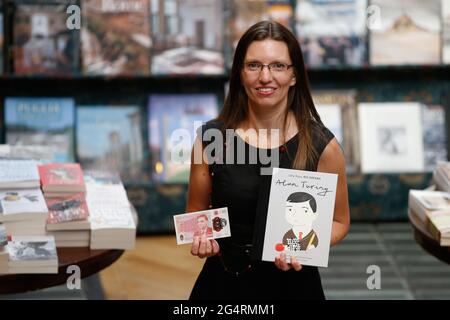 Sarah John, chief cashier of the Bank of England, with a new 50-pound ...
