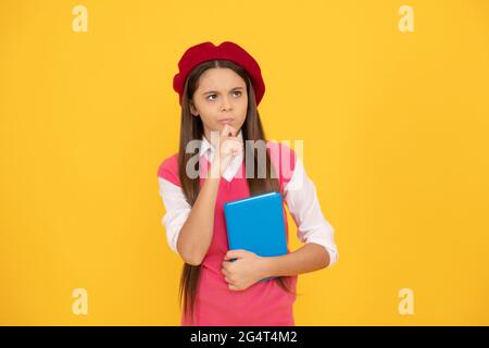 curiosity. thoughtful child with book. teenage student. tween and youth ...