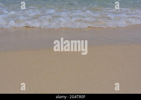 Close up small tide bubble and wave of sea to beach Stock Photo - Alamy
