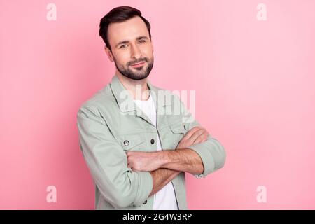 Content handsome young bearded father crouching near food stall and ...