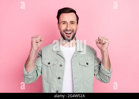 Photo of crazy excited nice fan guy show two rock gestures open mouth ...