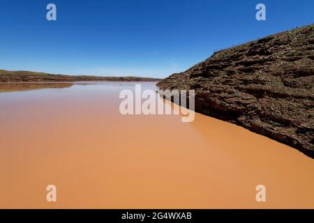 Neckartal-Dam west of Keetmanshoop: Fish River, water running over the ...