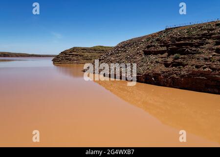 Neckartal-Dam west of Keetmanshoop: Fish River, water running over the ...