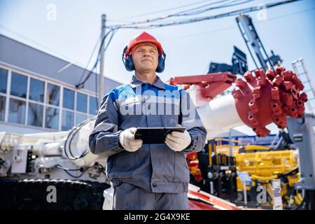 Tunneling machine digger in an underground opal mine. Coober Pedy ...