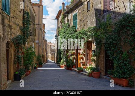 Italy, Tuscany, Pitigliano, Quaint alley of old town Stock Photo - Alamy