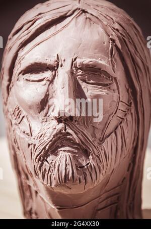 Photograph of Jesus Christ face clay sculpture Stock Photo - Alamy