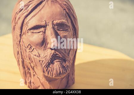 Photograph of Jesus Christ face clay sculpture Stock Photo - Alamy