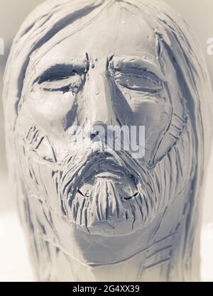 Photograph of Jesus Christ face clay sculpture Stock Photo - Alamy