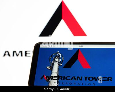 In this photo illustration, an American Tower Corporation (ATC) logo is ...
