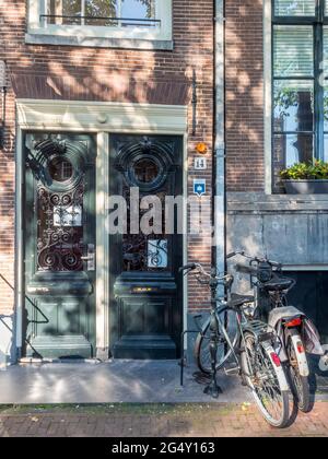 AMSTERDAM - OCTOBER 2: Peaceful warm morning scene along canal in ...