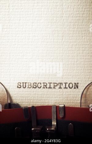 The word subscription written with a typewriter Stock Photo - Alamy