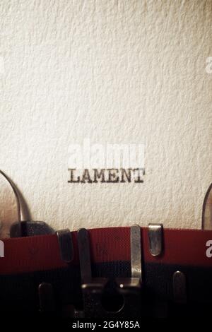 The word lament written with a typewriter Stock Photo - Alamy