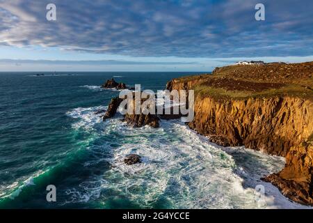 The cliffs and sea arch at Land's End in Cornwall Stock Photo - Alamy
