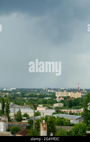 HDR city landscape. Gloomy rainy sky over the city Stock Photo - Alamy