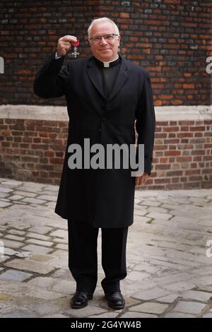 The Very Reverend Dr David Hoyle MBE blesses trees during a 'Trees For ...