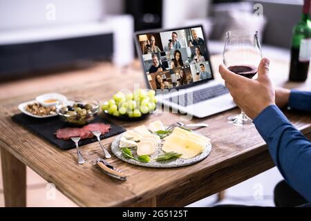 Digital Wine Tasting Virtual Dinner Event Using Laptop Stock Photo - Alamy