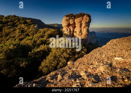 Sunset at the Morral del Drac cave, in the Sant Llorenç del Munt i l ...