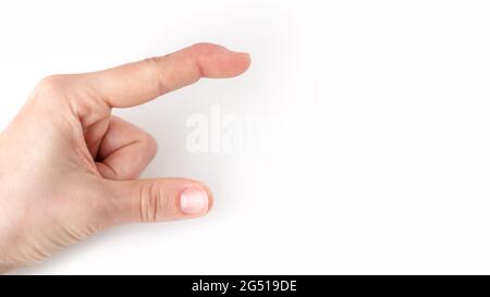 part of left hand showing downwards direction, index finger with a ...