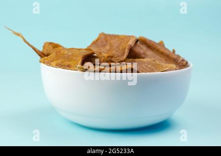 Training treats for pets on blue background. Natural Air Dried d Stock ...
