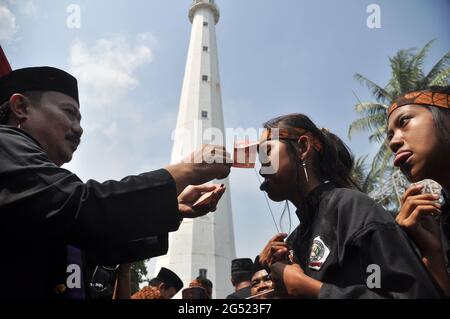 Banten, Indonesia - August 8, 2014 : The participants are doing a debus ...