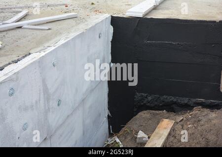 Waterproofing foundation bitumen and insulation with polystyrene foam ...