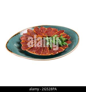 Isolated plate of dried beef tenderloin basturma Stock Photo - Alamy