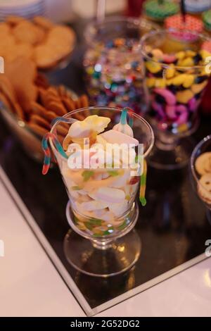 Chocolate candies on showcase in the store Stock Photo - Alamy