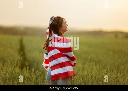 Independence day concept with woman lying down on american flag Stock ...