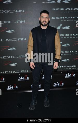 Jose Manuel Rincon poses for photos during a red carpet of Monarca Tv ...