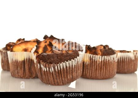 Several fragrant chocolate curd muffins on a metal tray, close-up, on a ...