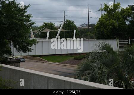 Railroad overpass bridge with tree and power lines in Cascade Park in ...